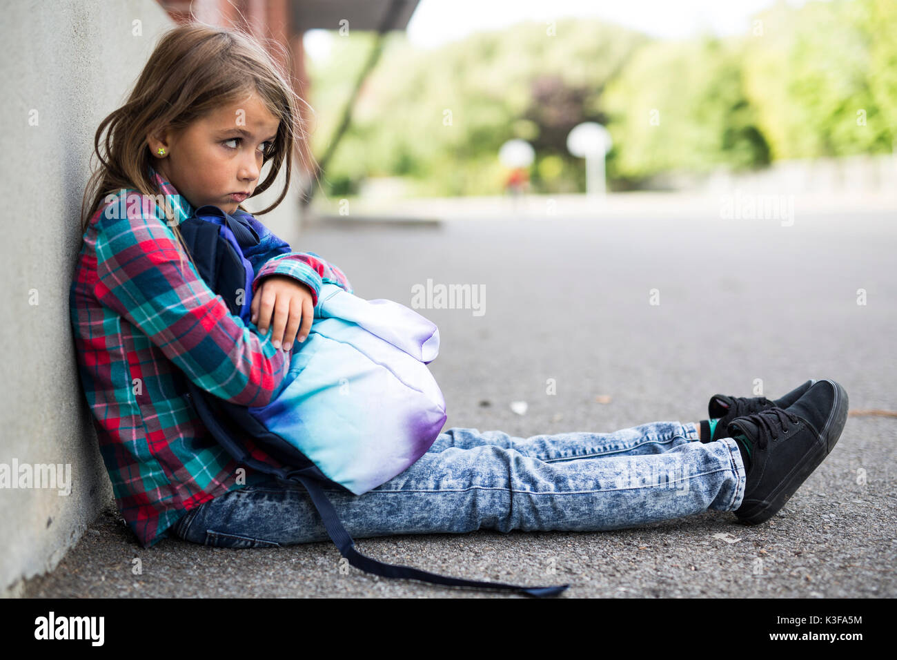 primary student depress at the school Stock Photo - Alamy