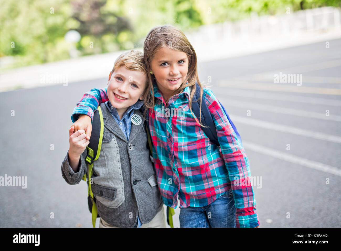 two childs girls primary school outside Stock Photo - Alamy