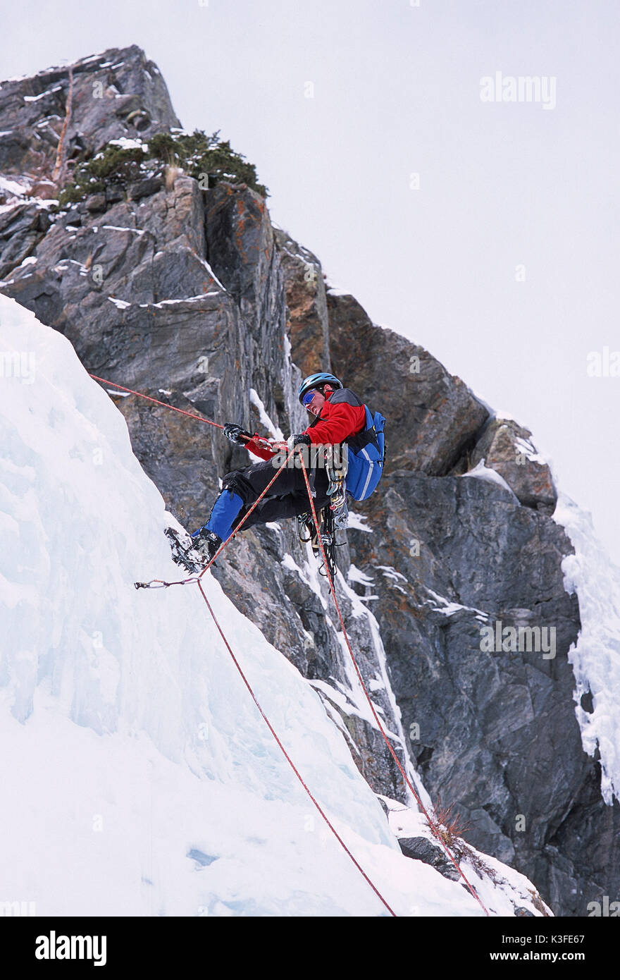 ice climber in cliff face Stock Photo - Alamy