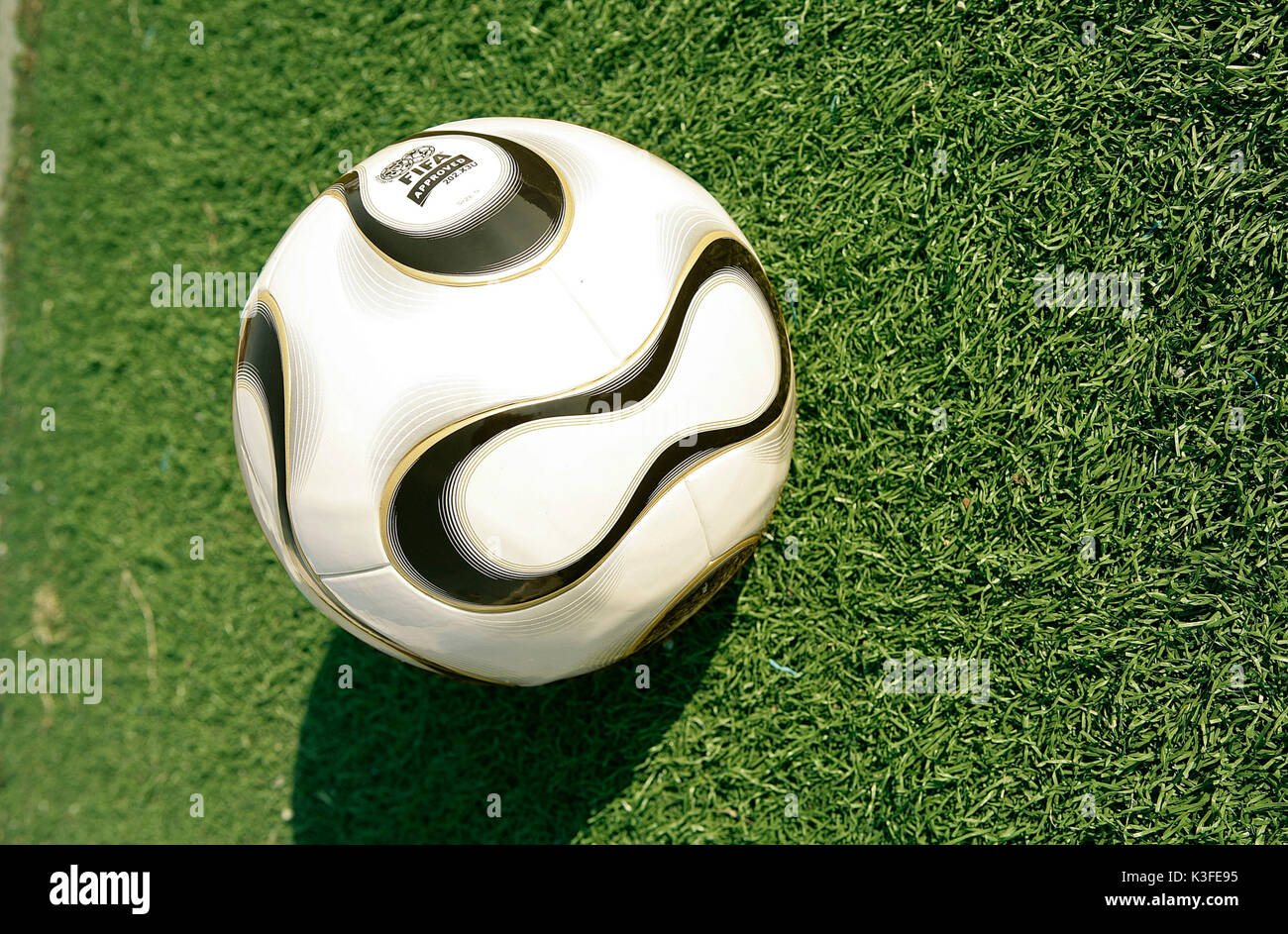 Football on turf Stock Photo - Alamy