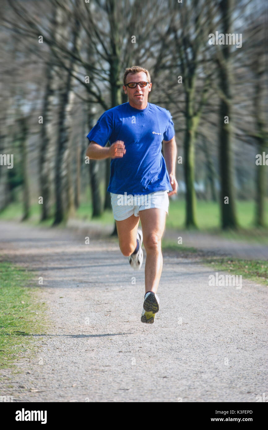 Man men jogging hi-res stock photography and images - Alamy