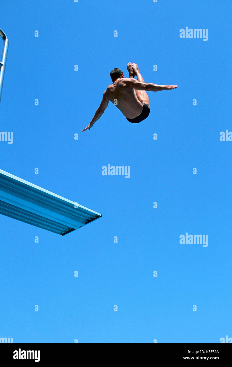 Tower jumper jumping of the springboard Stock Photo - Alamy