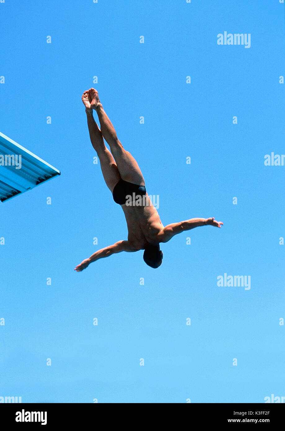 Tower jumper jumping of the springboard Stock Photo - Alamy