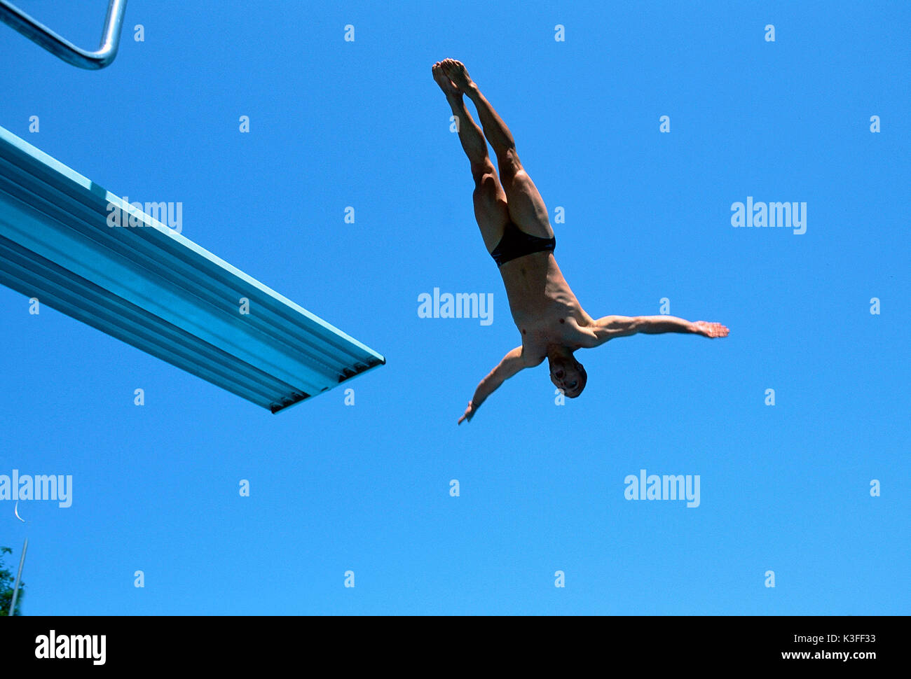 Tower jumper jumping of the springboard Stock Photo - Alamy