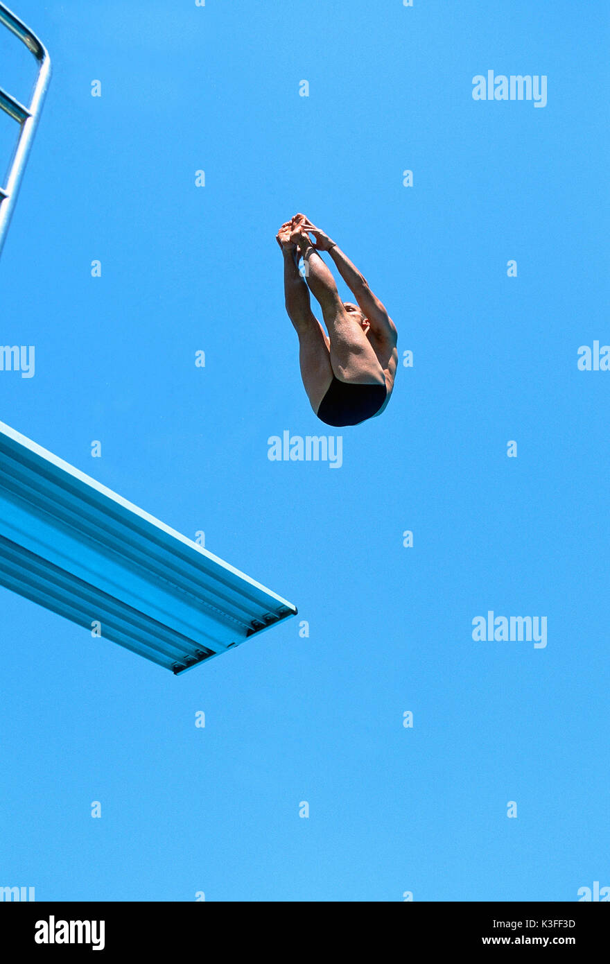 Tower jumper jumping of the springboard Stock Photo - Alamy