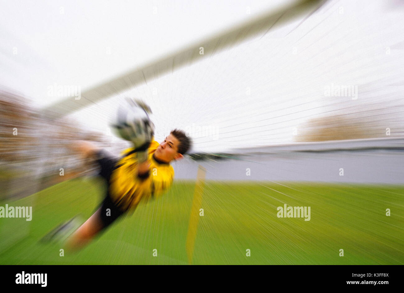 Goalkeeper jumping hi-res stock photography and images - Alamy
