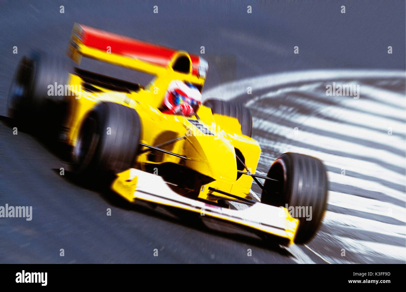 Formula one car racing Stock Photo - Alamy