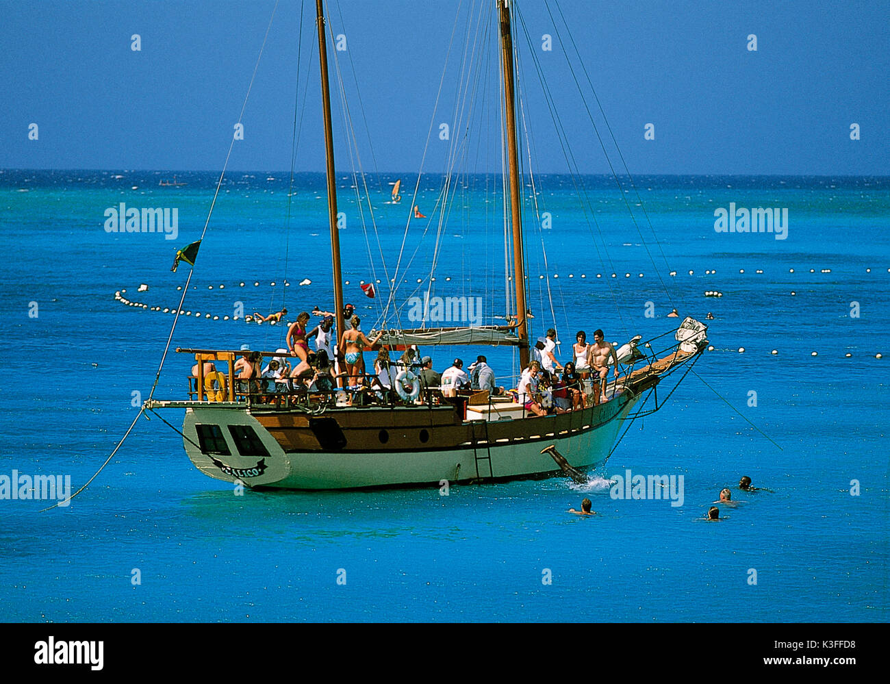Sailing ship on the sea with tourists aboard Stock Photo - Alamy