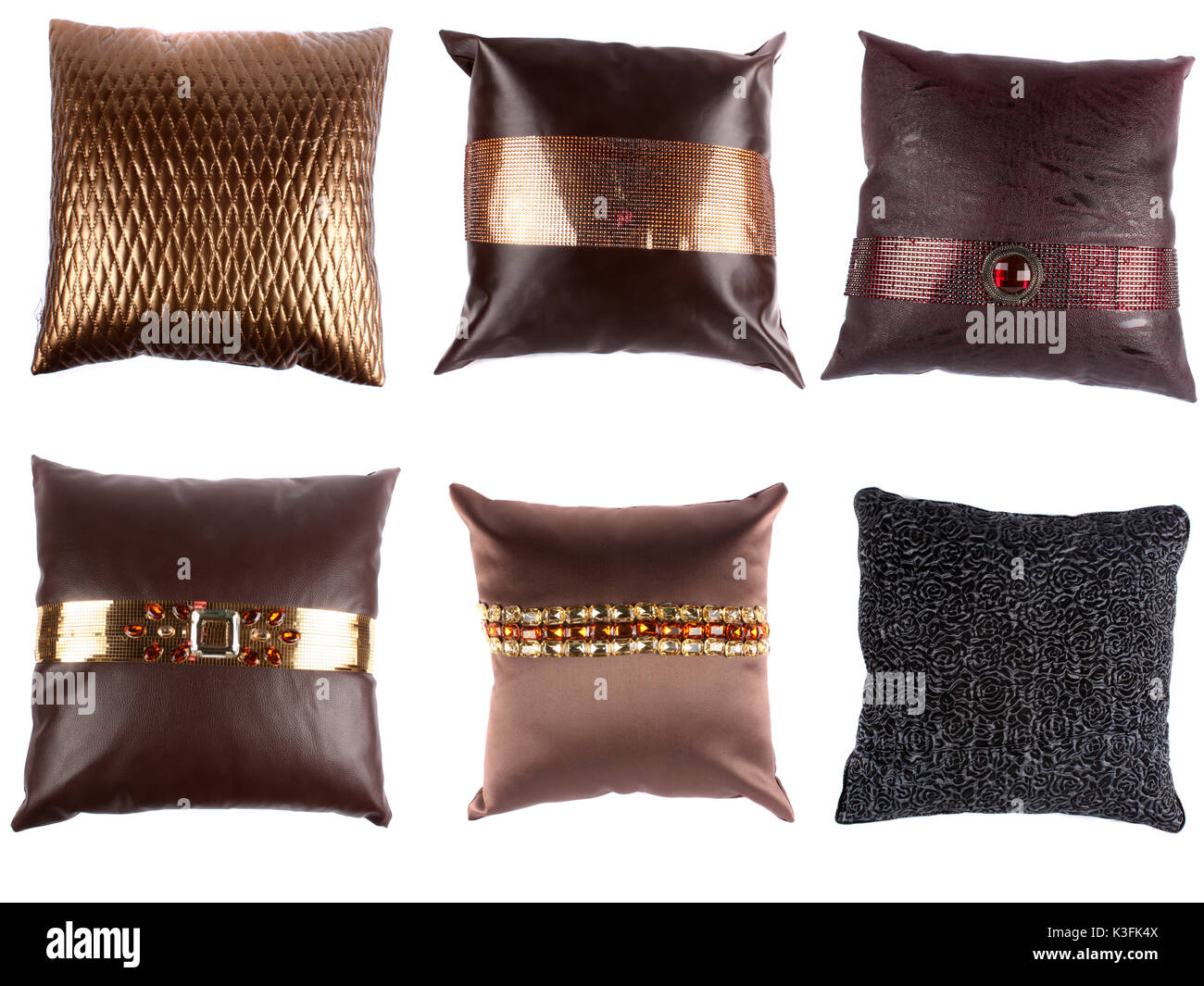 A set of beautiful designer pillows with inticrate designs, on white ...