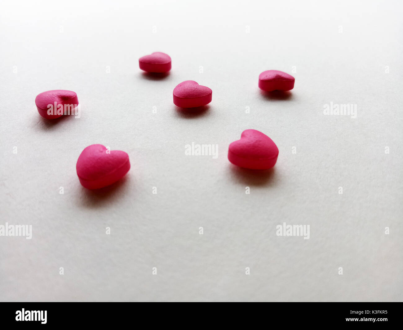 Heart Shaped Medicine Tablet Stock Photo - Alamy