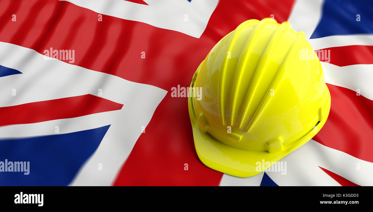 Yellow construction hat over UK flag. 3d illustration Stock Photo - Alamy