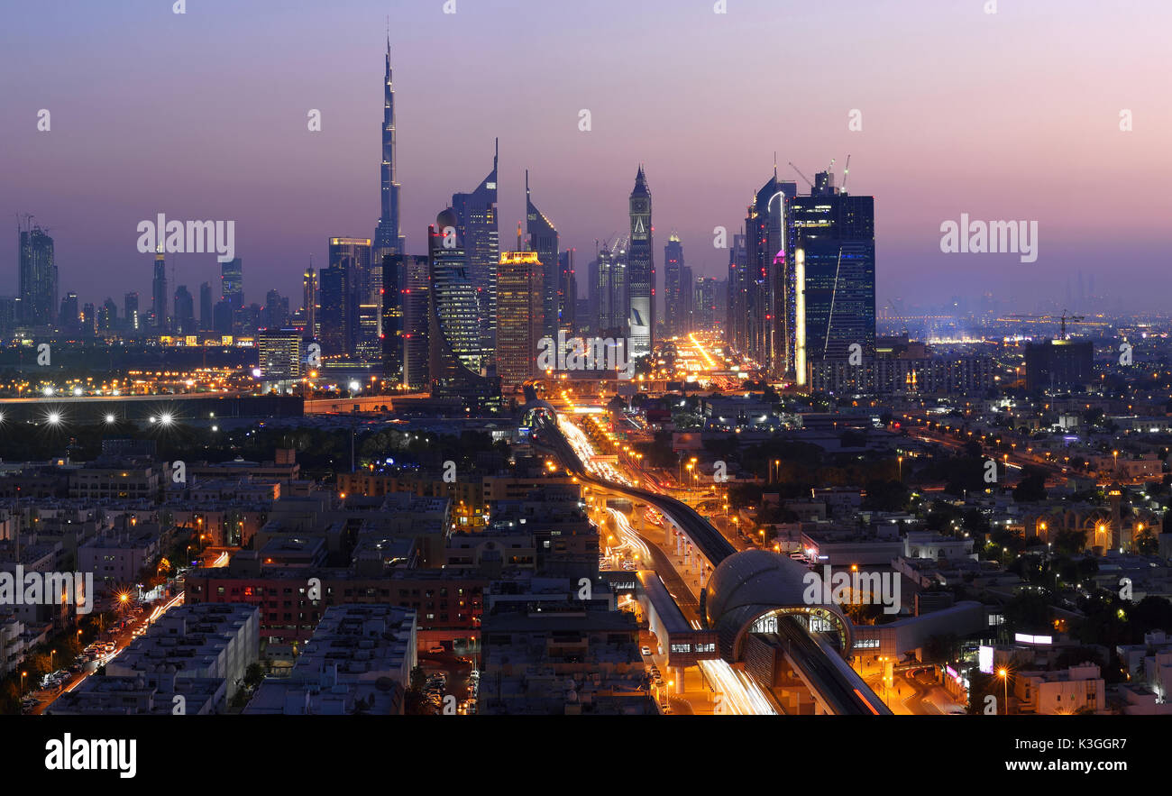 Skyline of Dubai at night Stock Photo - Alamy