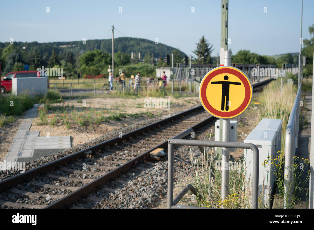 Stop sign on rail station Stock Photo - Alamy