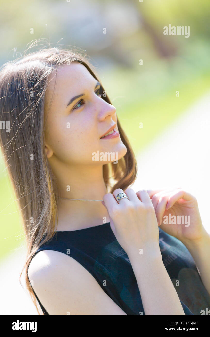 Head Outdoor Portrait Of A Brunette Slim Girl With Long Hair In The