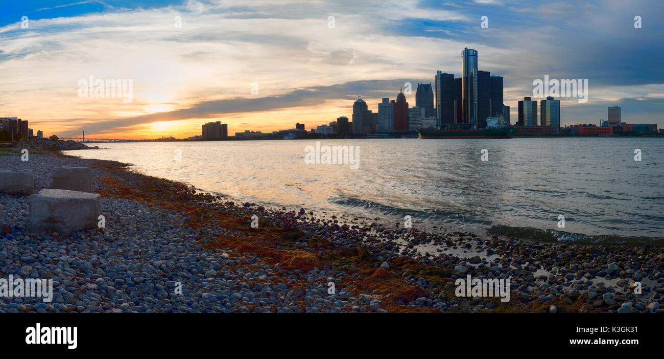 Panoramic view of Detroit city skyline at sunset from the shoreline ...