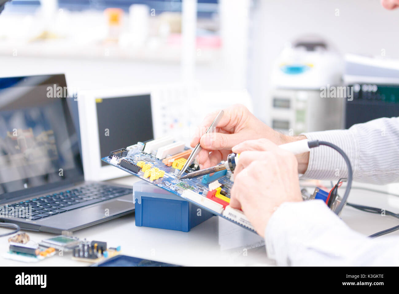 repair electronics device in laboratory Stock Photo - Alamy
