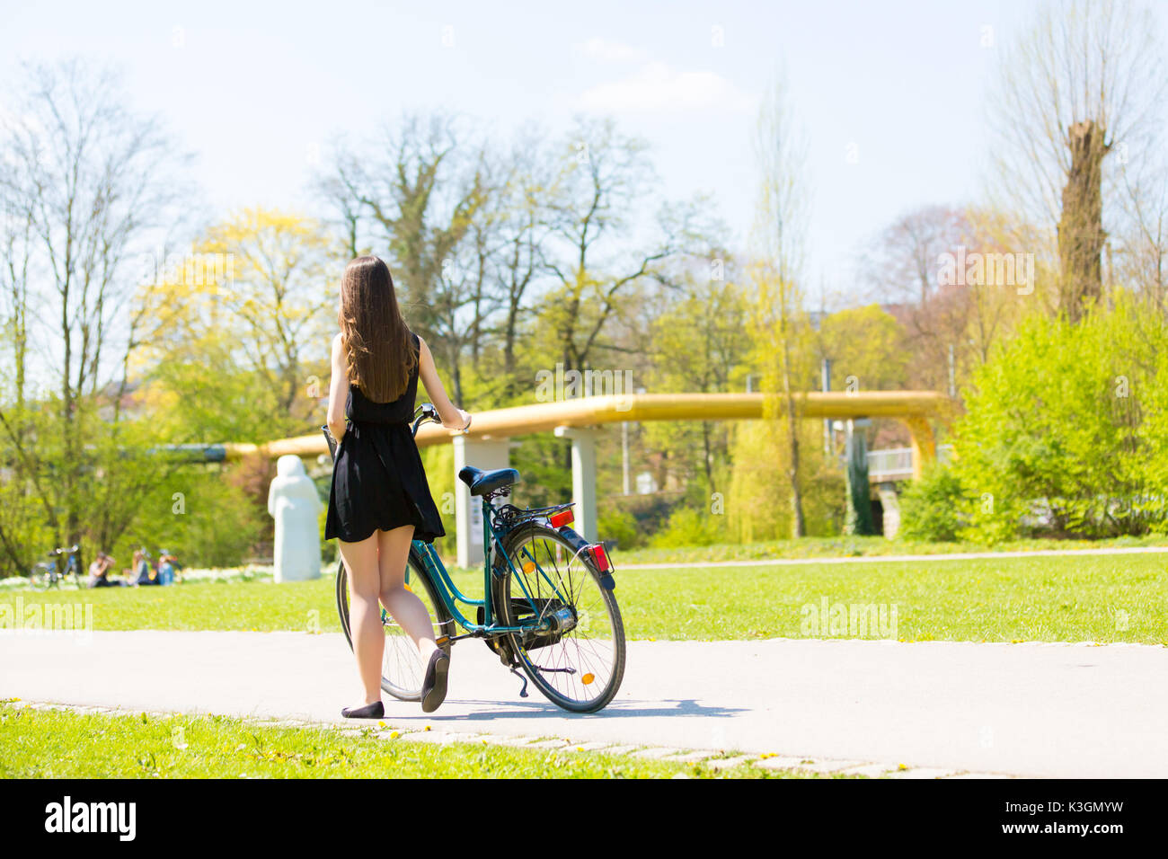 Back view of girl on bike hi-res stock photography and images - Alamy
