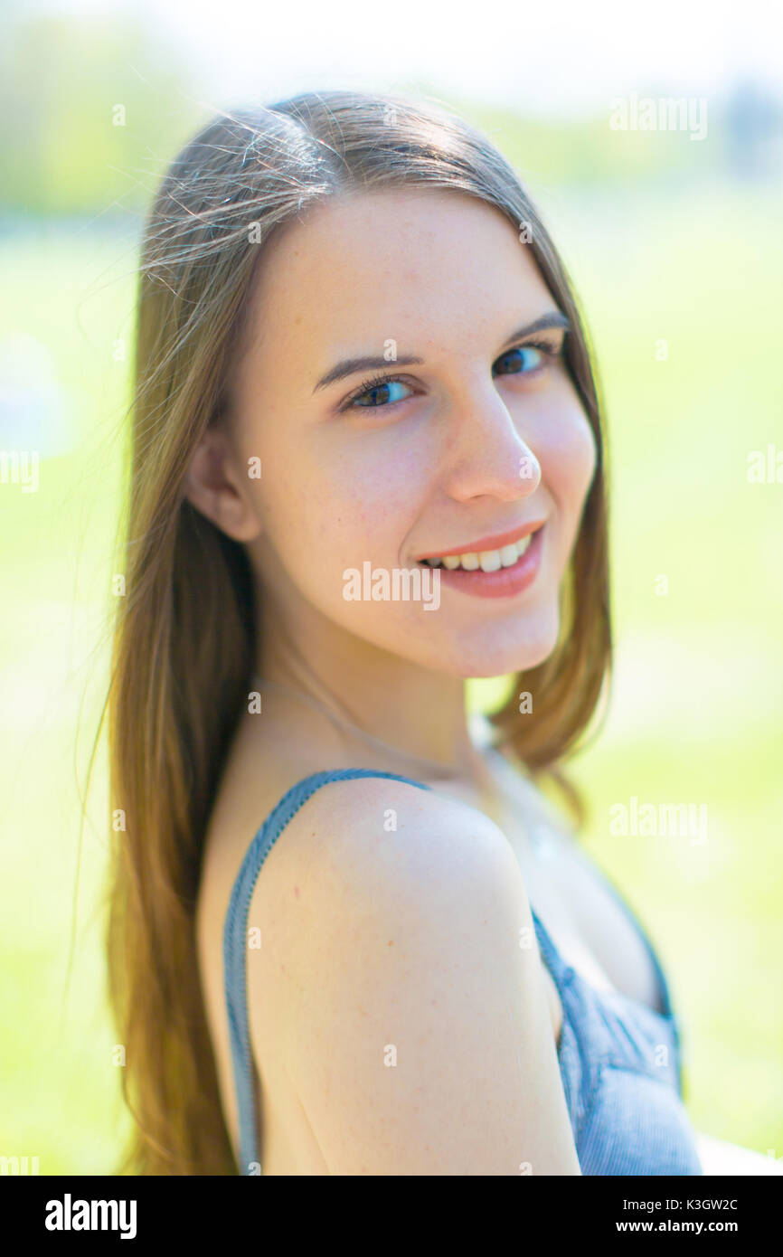 Head Outdoor Portrait Of A Brunette Slim Girl With Long Hair In The