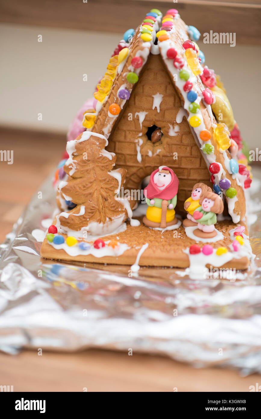 a homemade witch's gingerbread house decorated with sweets Stock Photo ...