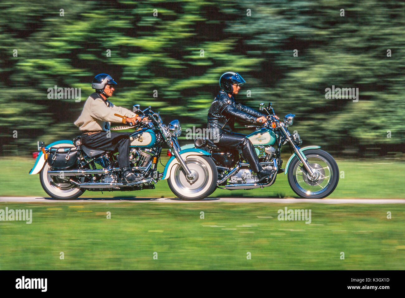 Two moving Harley Davidson motorcycles Stock Photo - Alamy