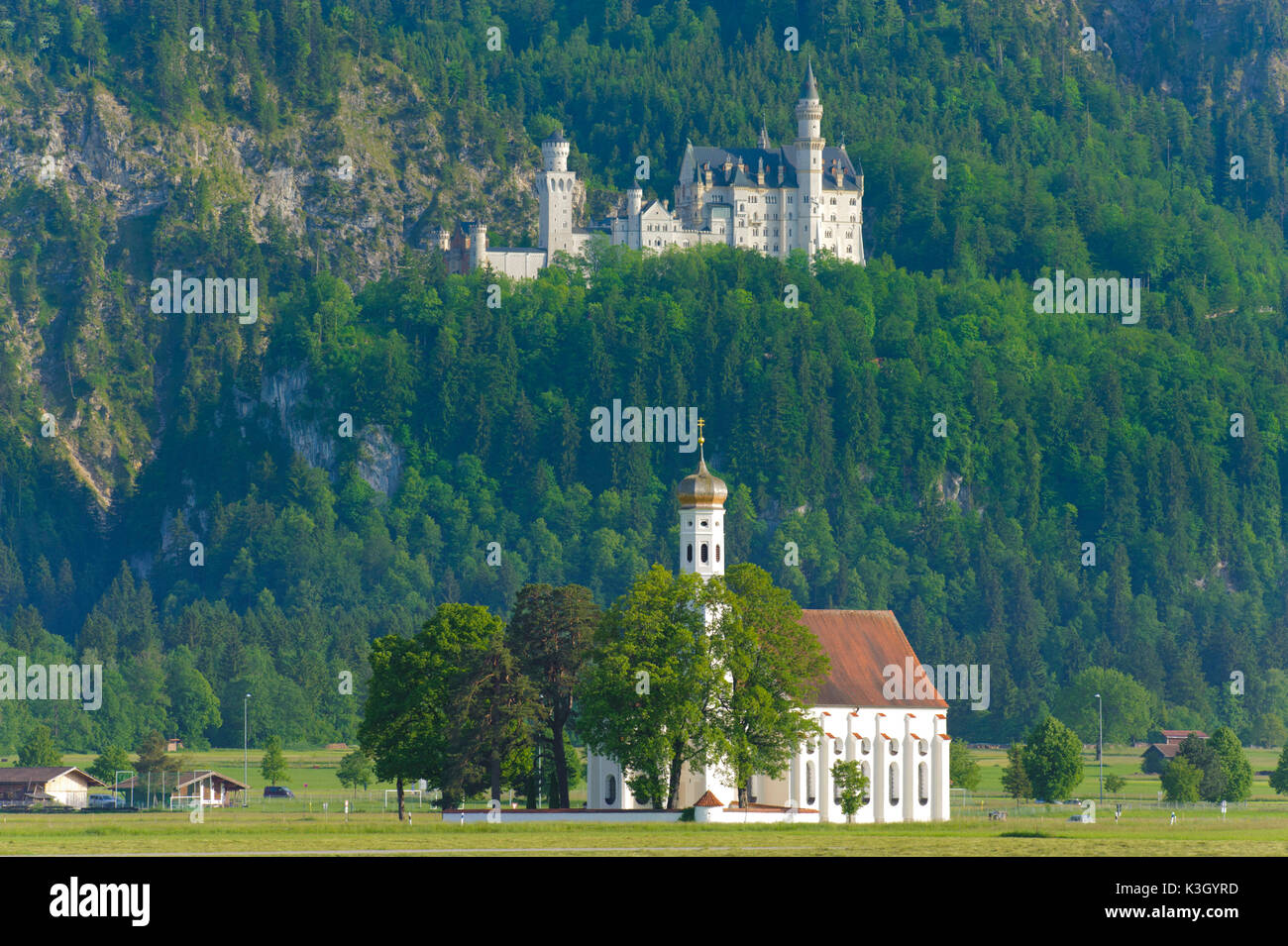 castle Neuschwanstein and pilgrimage church St. Coloman in the Allgäu ...