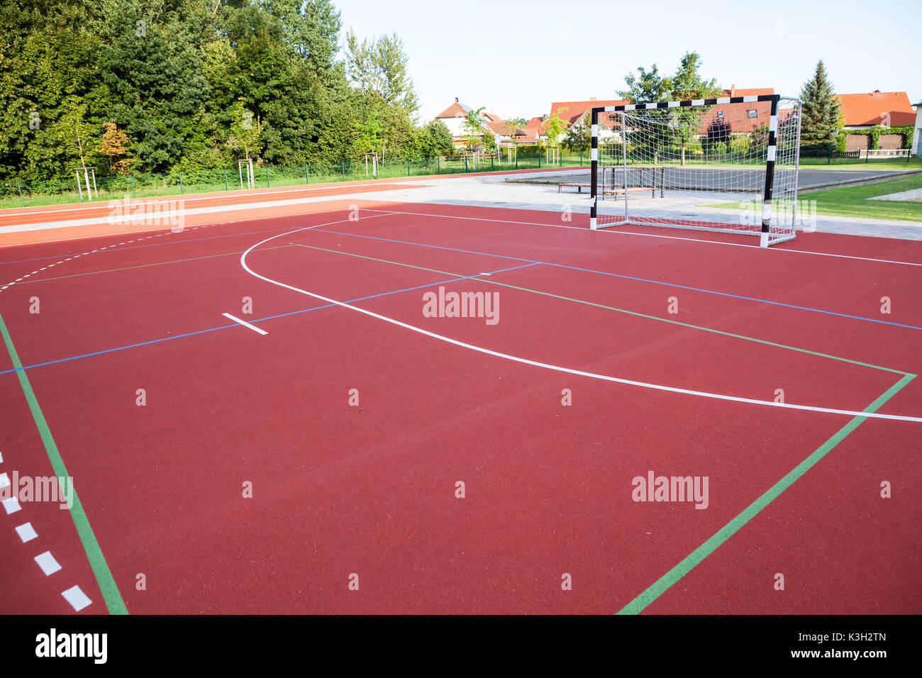 outdoors this beautiful mini soccer field is in red Stock Photo - Alamy