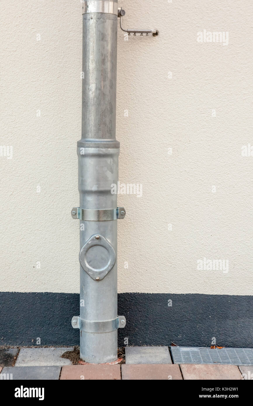an rain drain pipe with a chill stop Stock Photo - Alamy