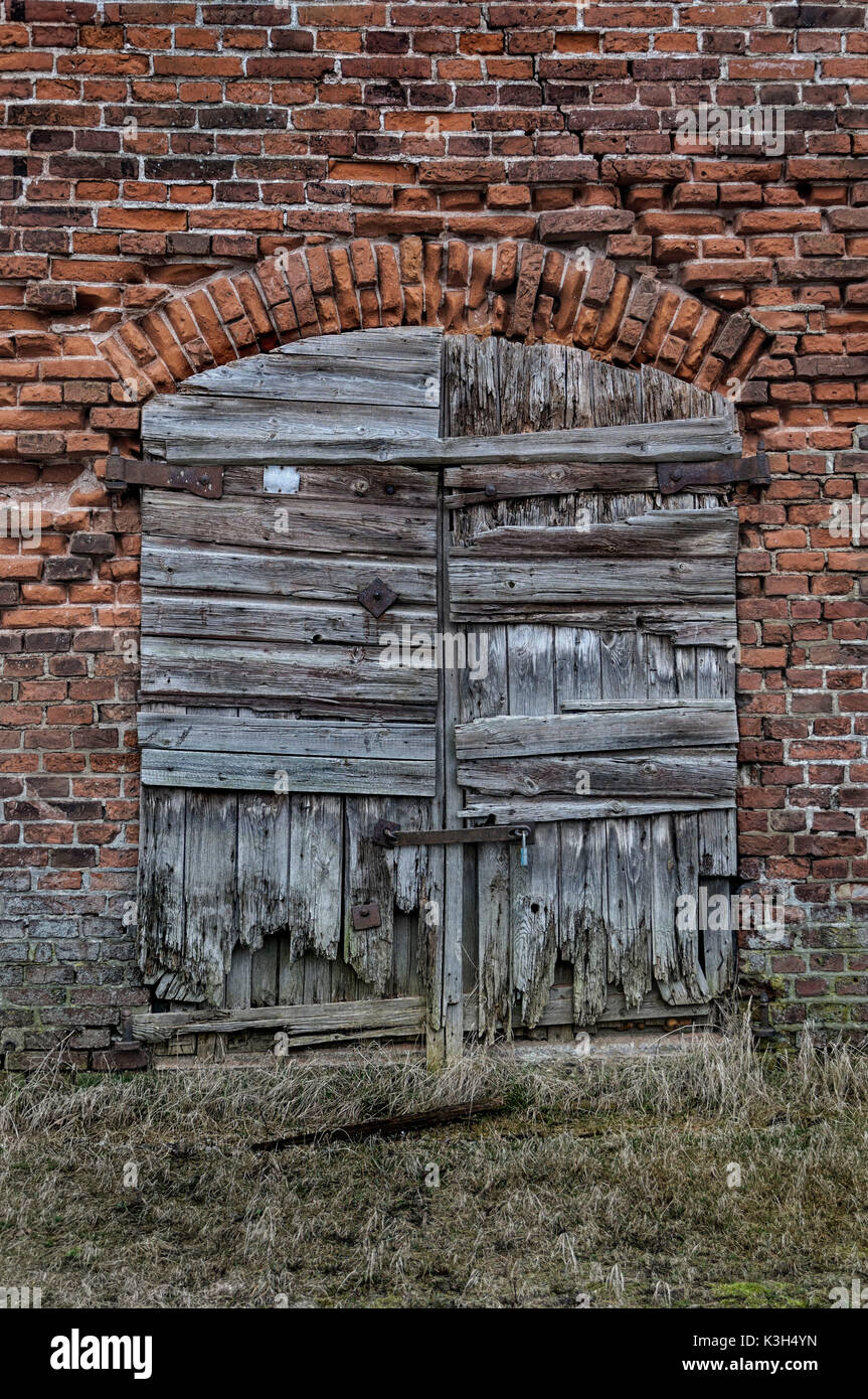 Symbol / Concepts, Very old wooden gate at the garage Stock Photo - Alamy