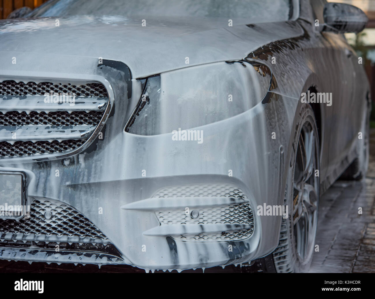 washing the car with foam Stock Photo - Alamy
