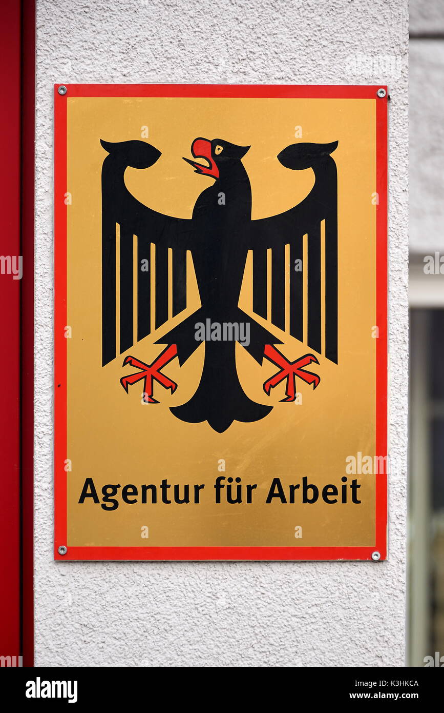 German shield for job agency Stock Photo - Alamy
