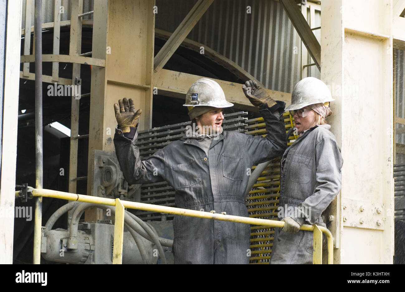 JEREMY RENNER as Bobby Sharp and CHARLIZE THERON as Josey Aimes in ...