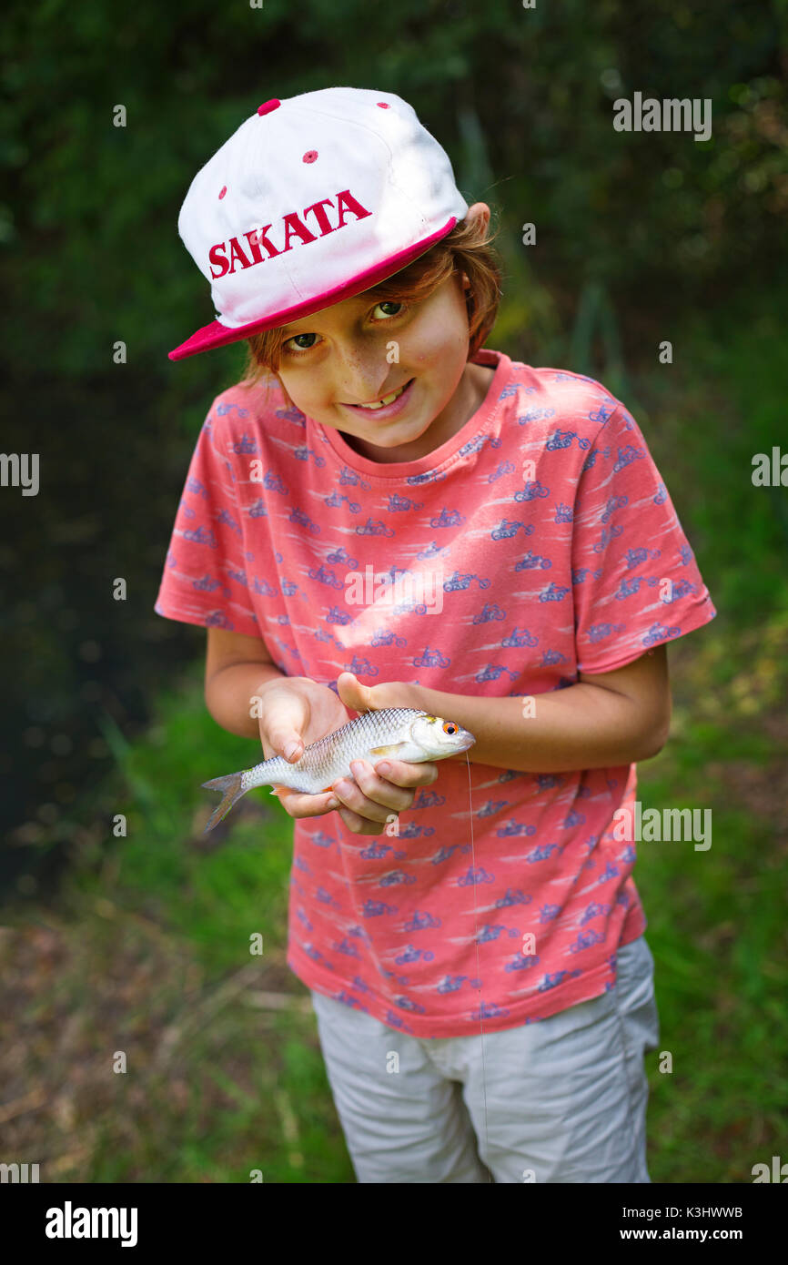 Boy caught fish hi-res stock photography and images - Alamy