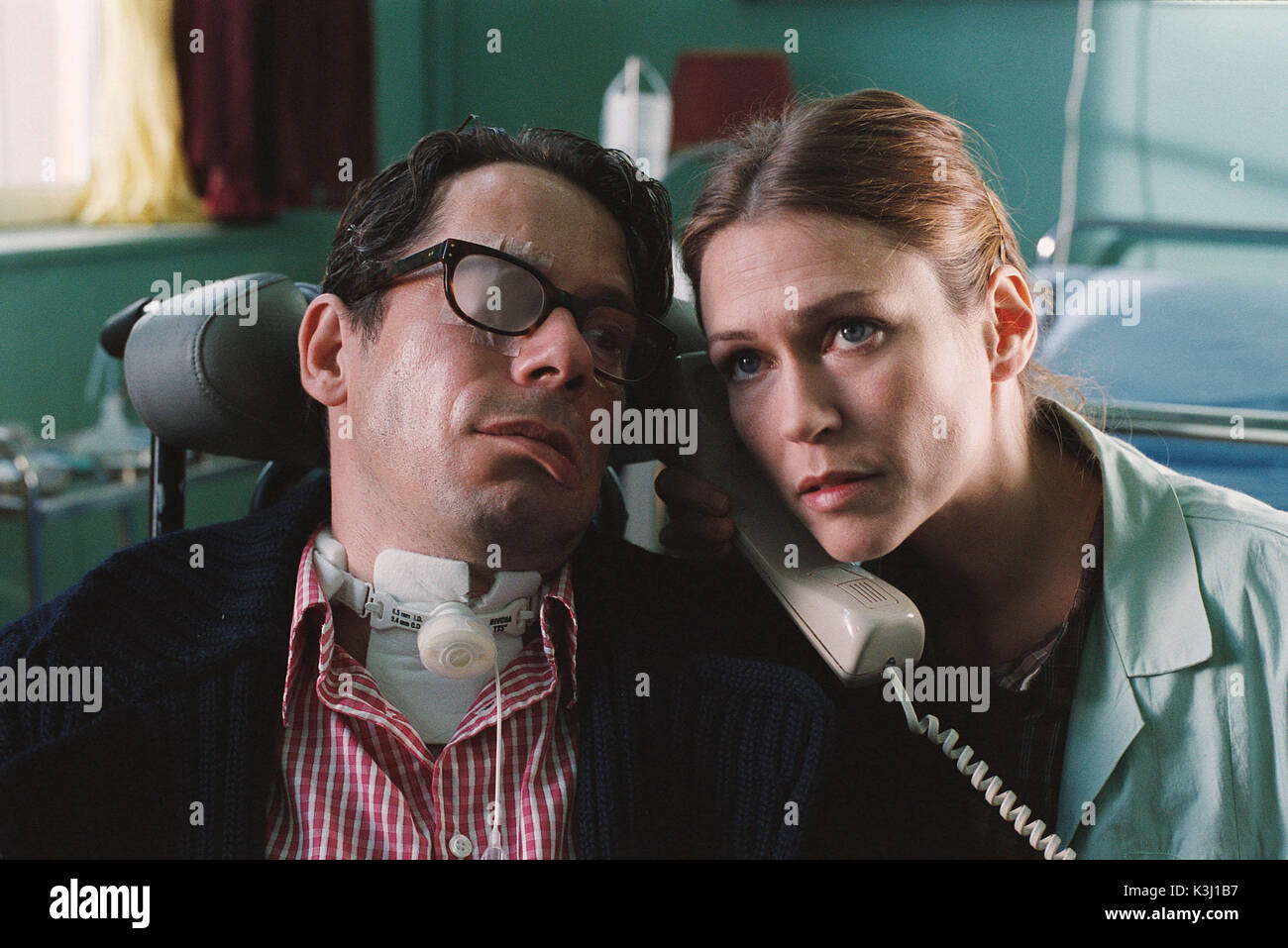 Mathieu Amalric as Jean-Dominique Bauby and Marie-Josee Croze as ...
