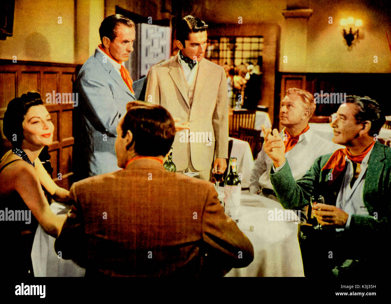 THE SUN ALSO RISES from left - AVA GARDNER, TYRONE POWER, MEL FERRER , ROBERT EVANS, EDDIE ...