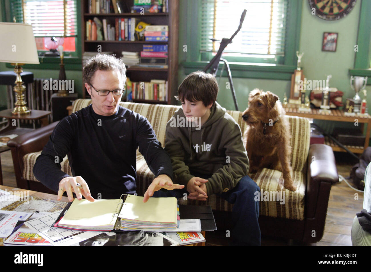 Director, Todd Holland explains a scene to Josh Hutcherson, while Rex ...