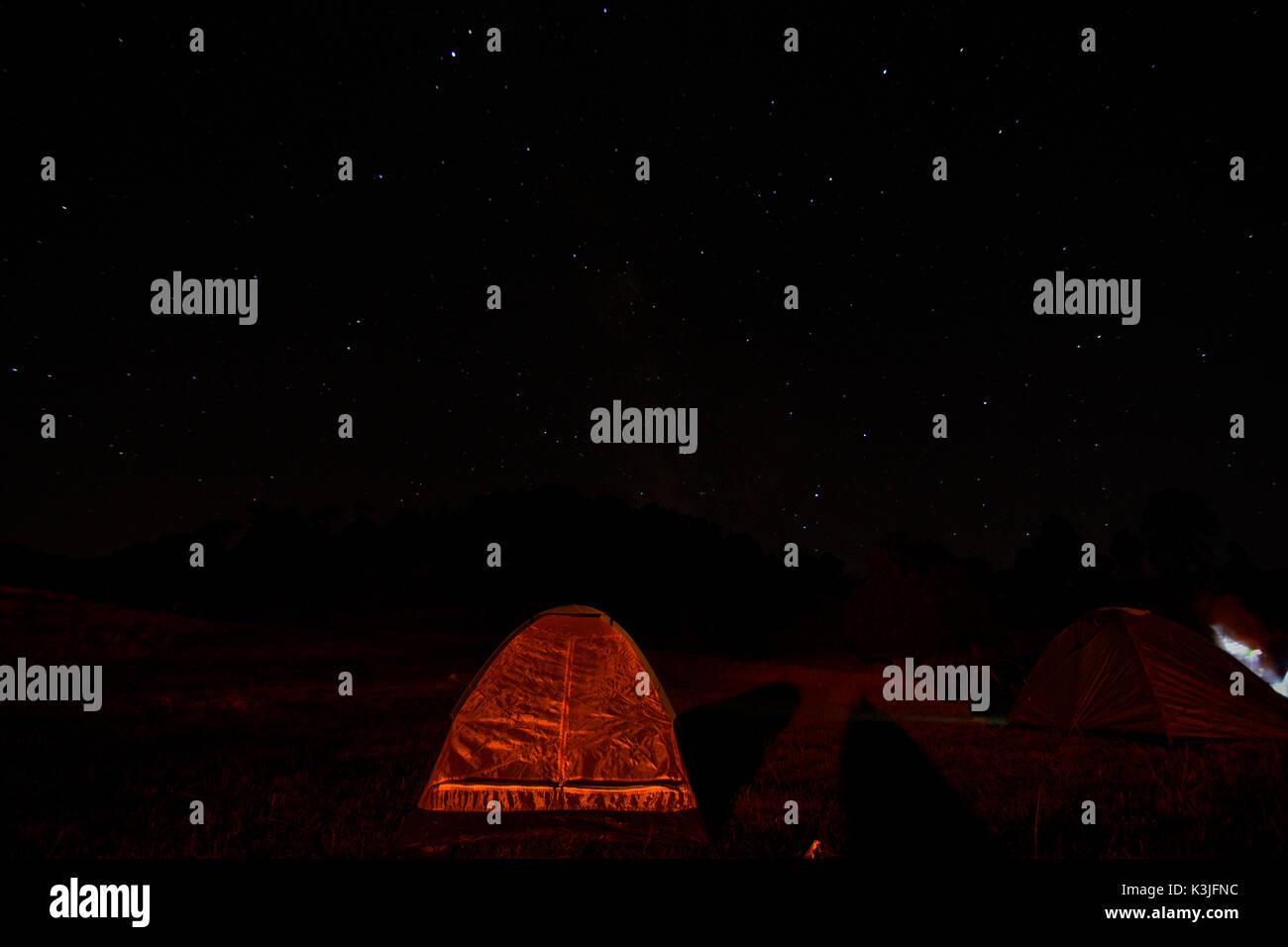 camp and camp fire under the stars Stock Photo - Alamy