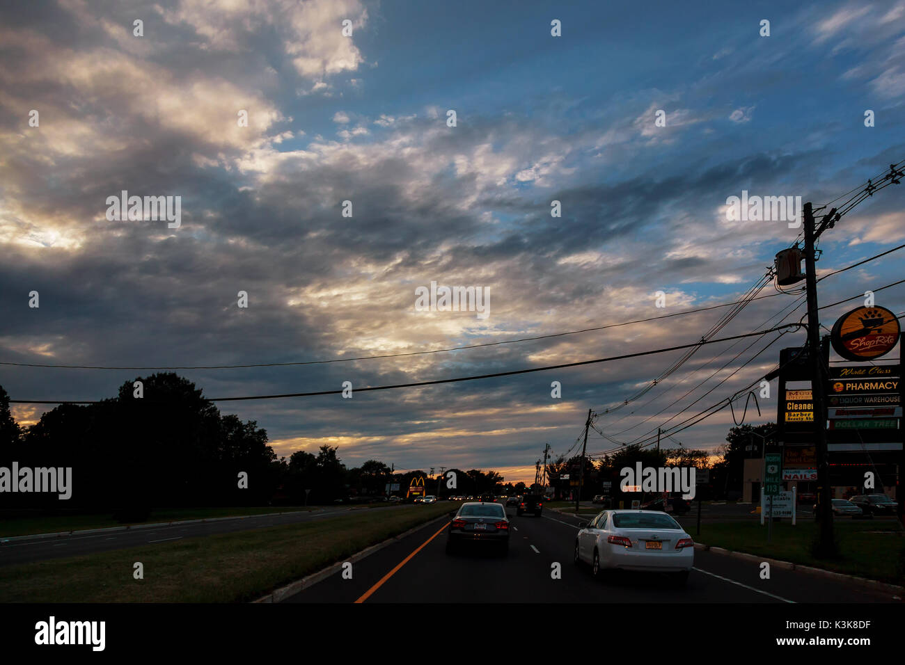 Night traffic, cars on highway road on sunset evening night in busy ...