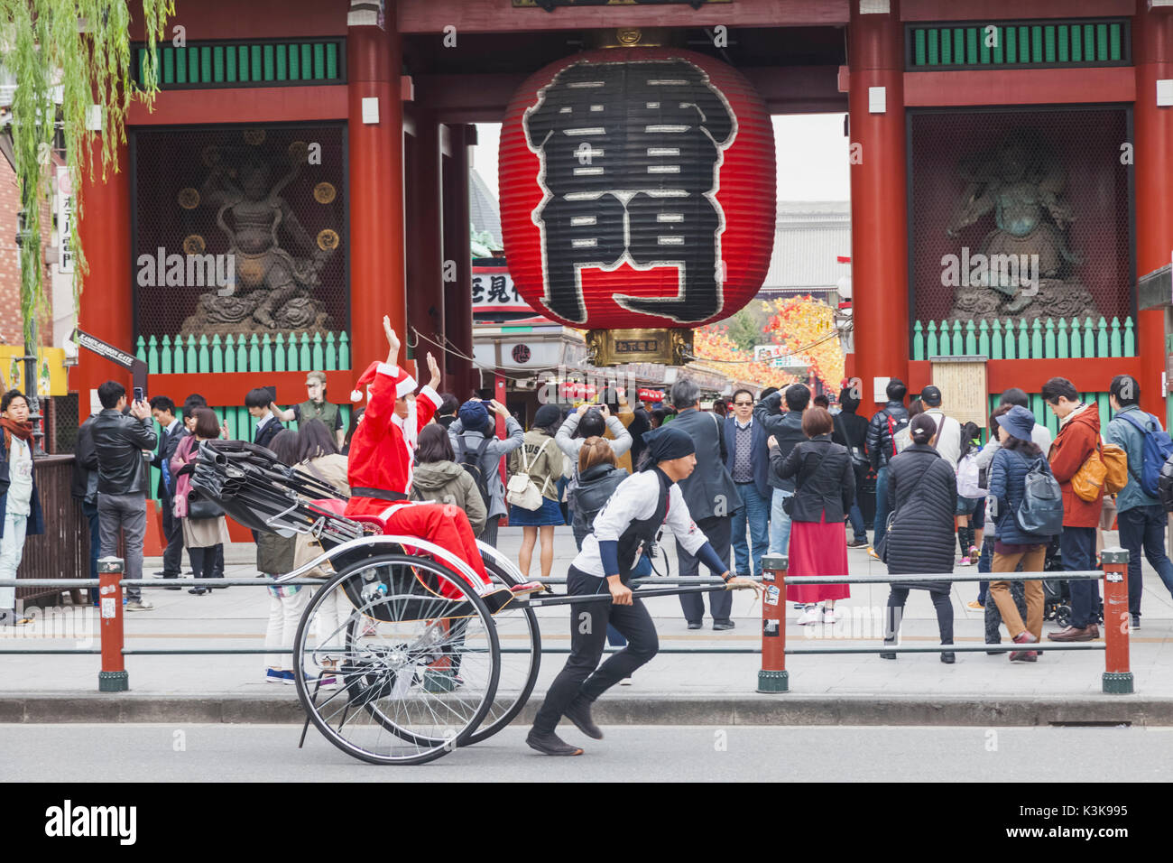Japan, Hoshu, Tokyo, Asakusa, Man Dressed as Father Christmas in ...
