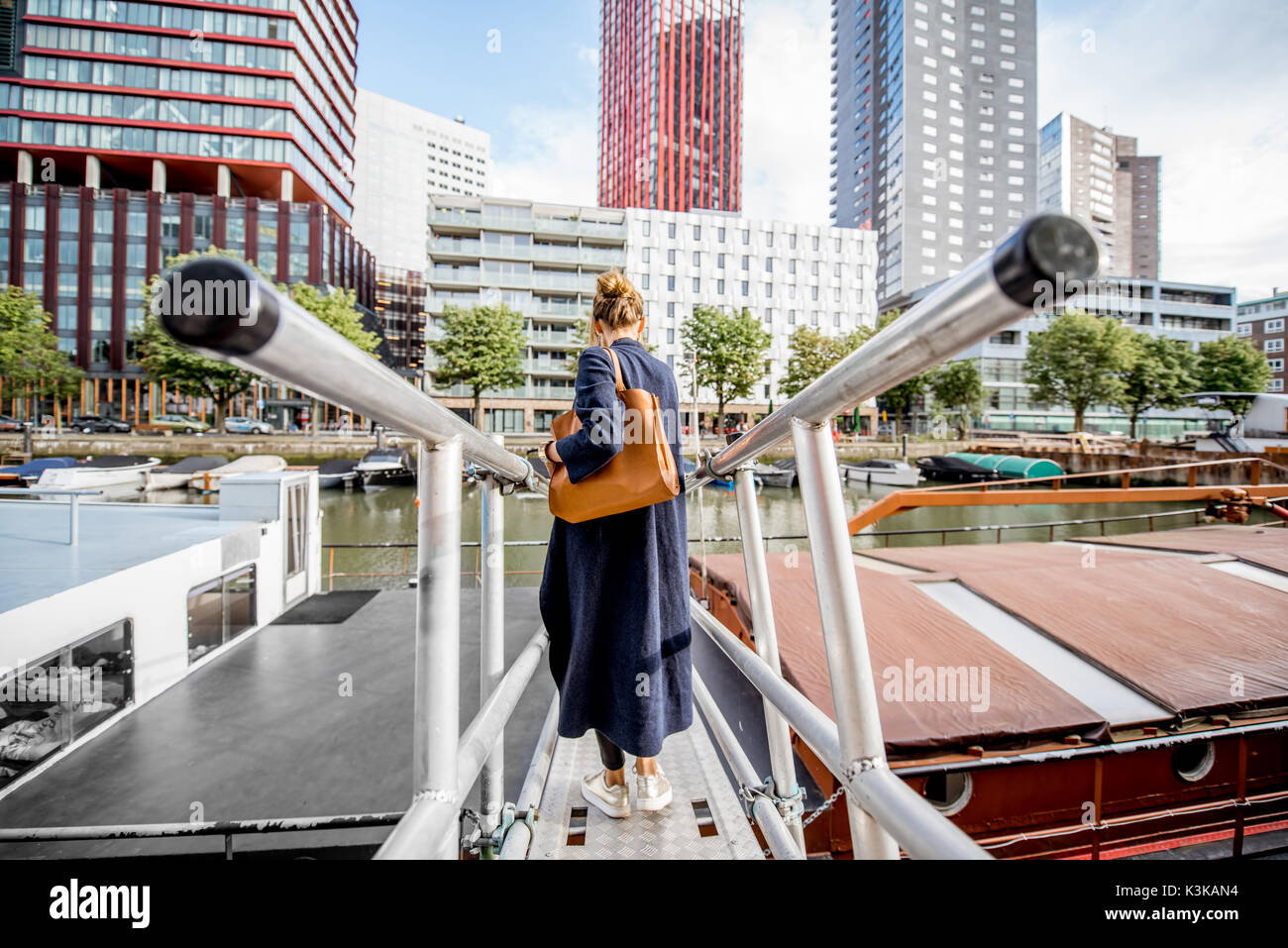 Woman in Rotterdam city Stock Photo - Alamy