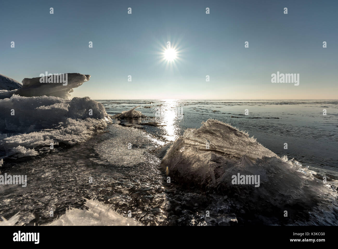 Rising sun reflected on sea hi-res stock photography and images - Alamy