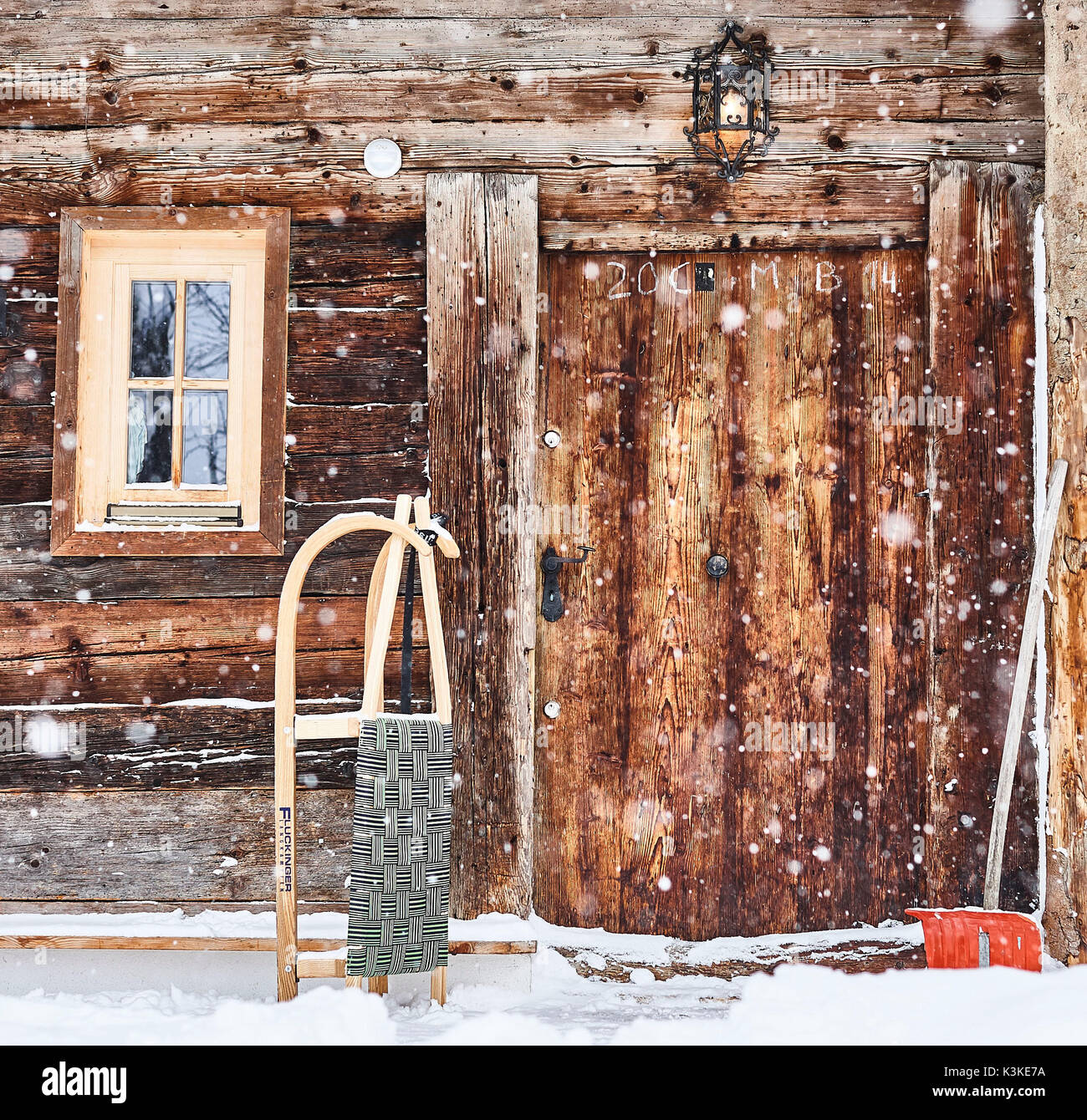 old farm door, slides, snow shovel, snowfall Stock Photo - Alamy
