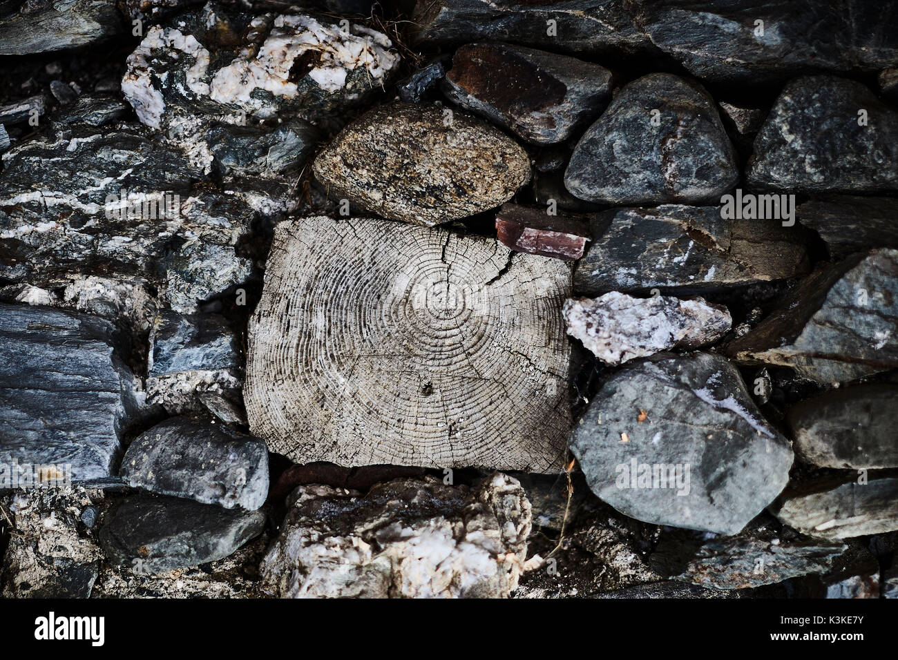 old stone wall with wooden beam, notch Stock Photo - Alamy
