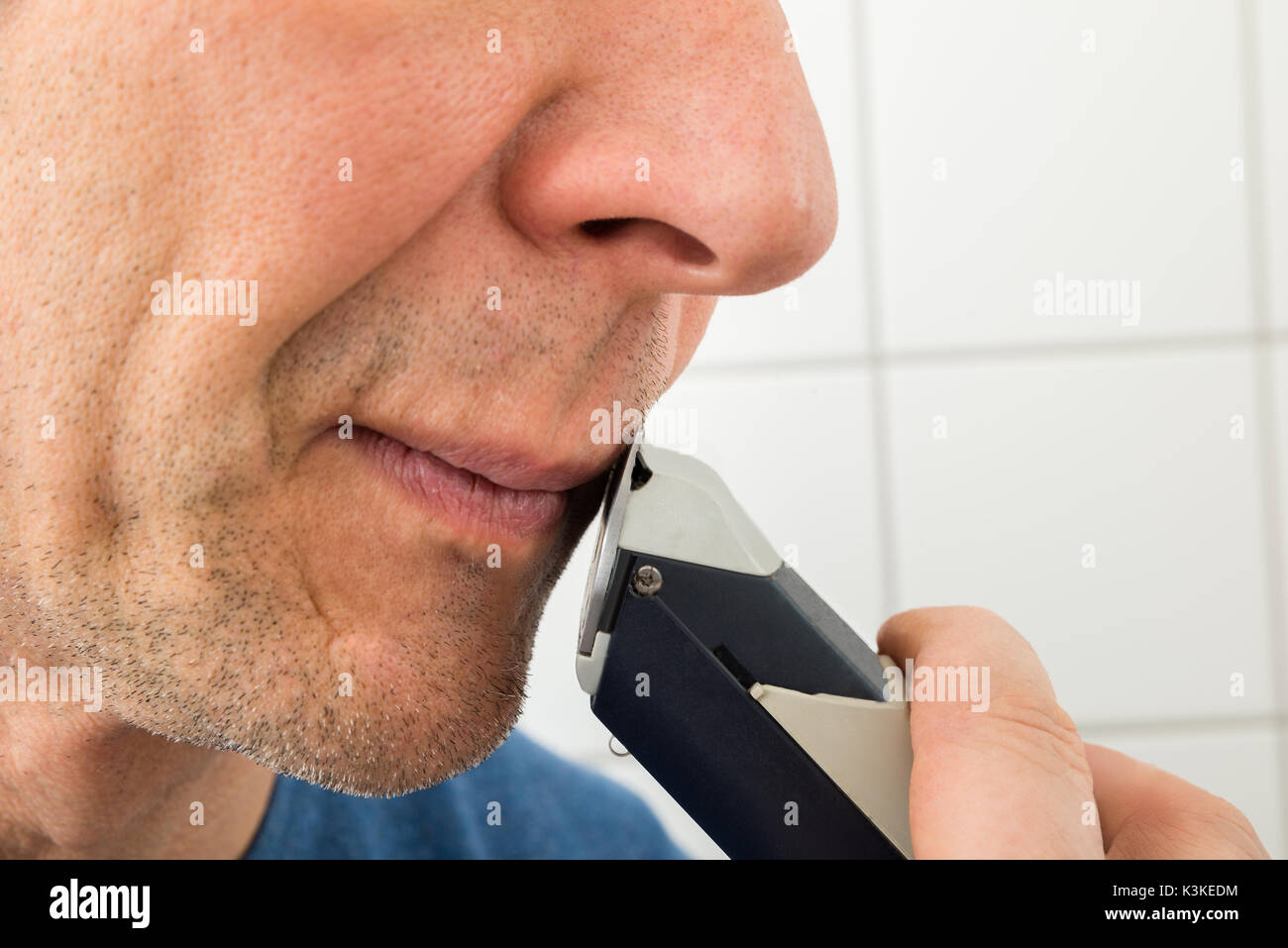 Male shaving trimming hair hi-res stock photography and images - Alamy