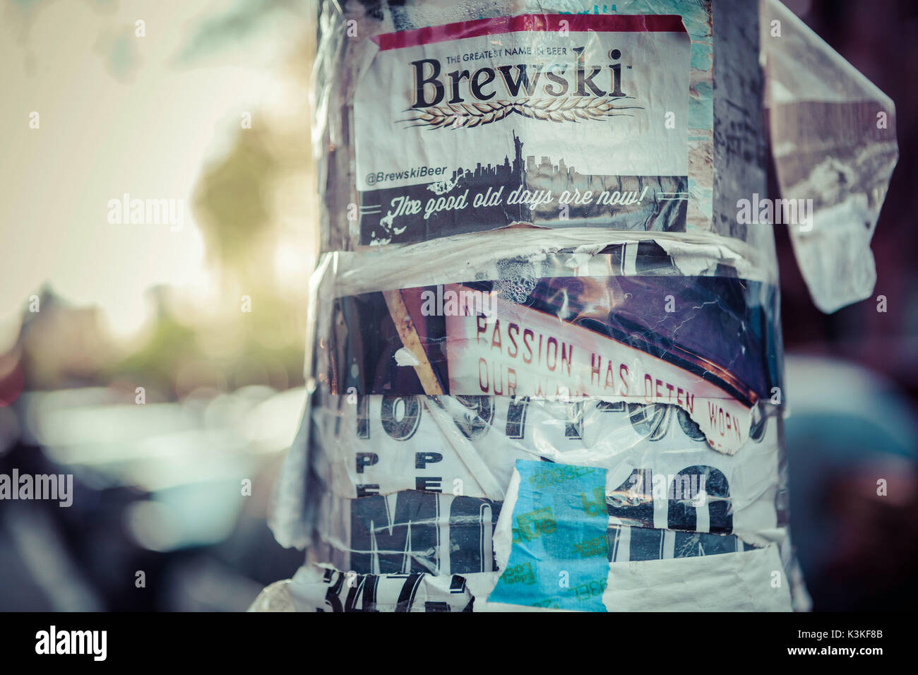 Ads and stickers on a lamp post, streetview, Manhatten, New York, USA ...