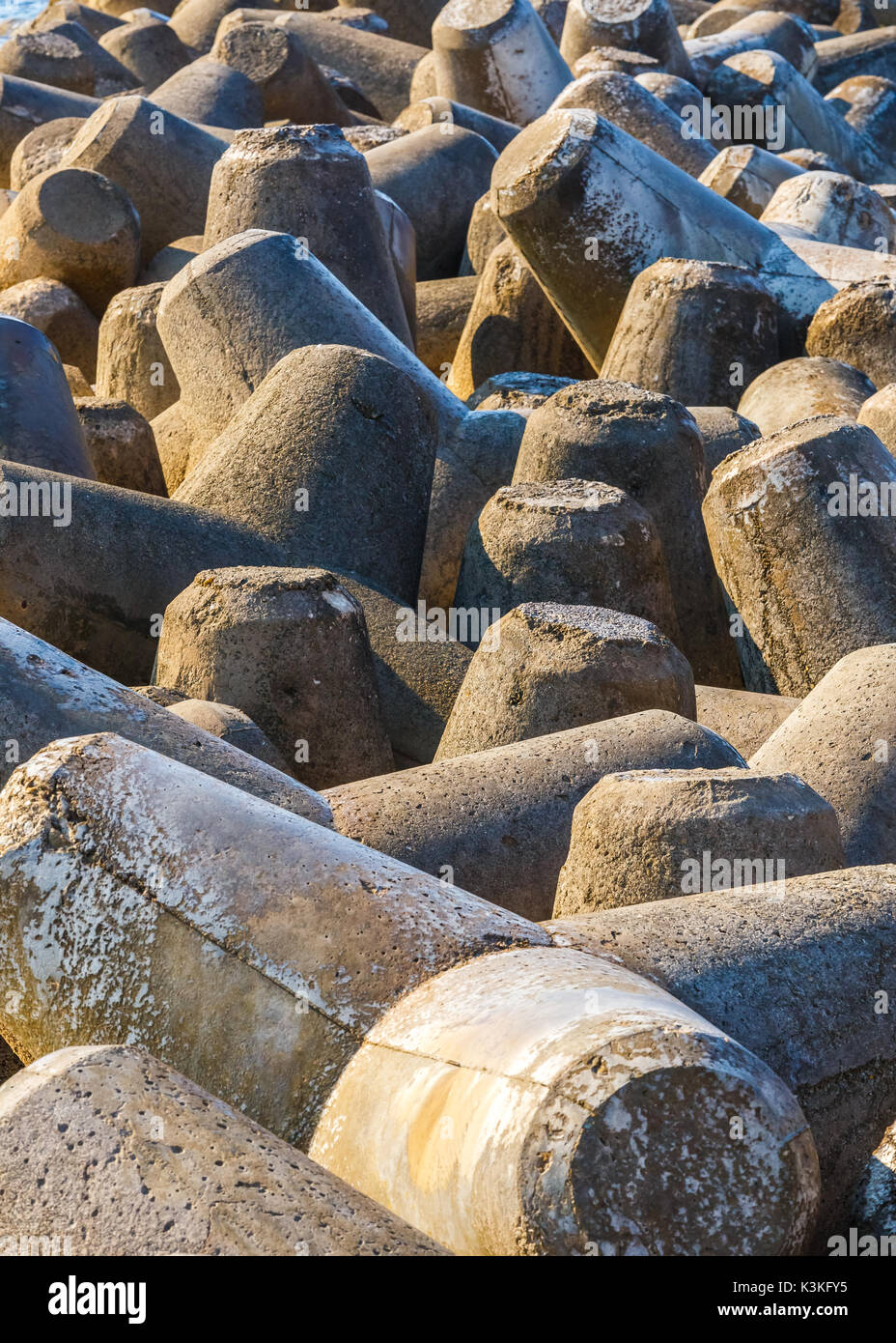 Concrete blocks in marina harbor against sea storms in Greece Stock ...
