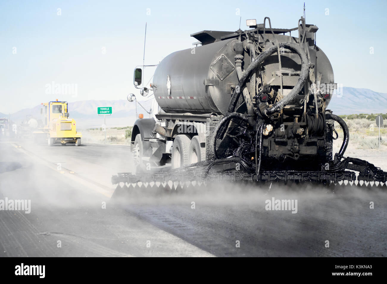 Spraying tar hi-res stock photography and images - Alamy