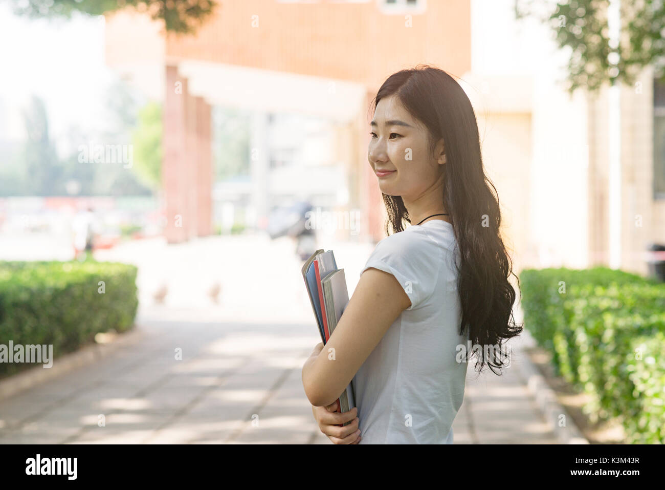 Happy of a Asian college student at Campus Stock Photo - Alamy