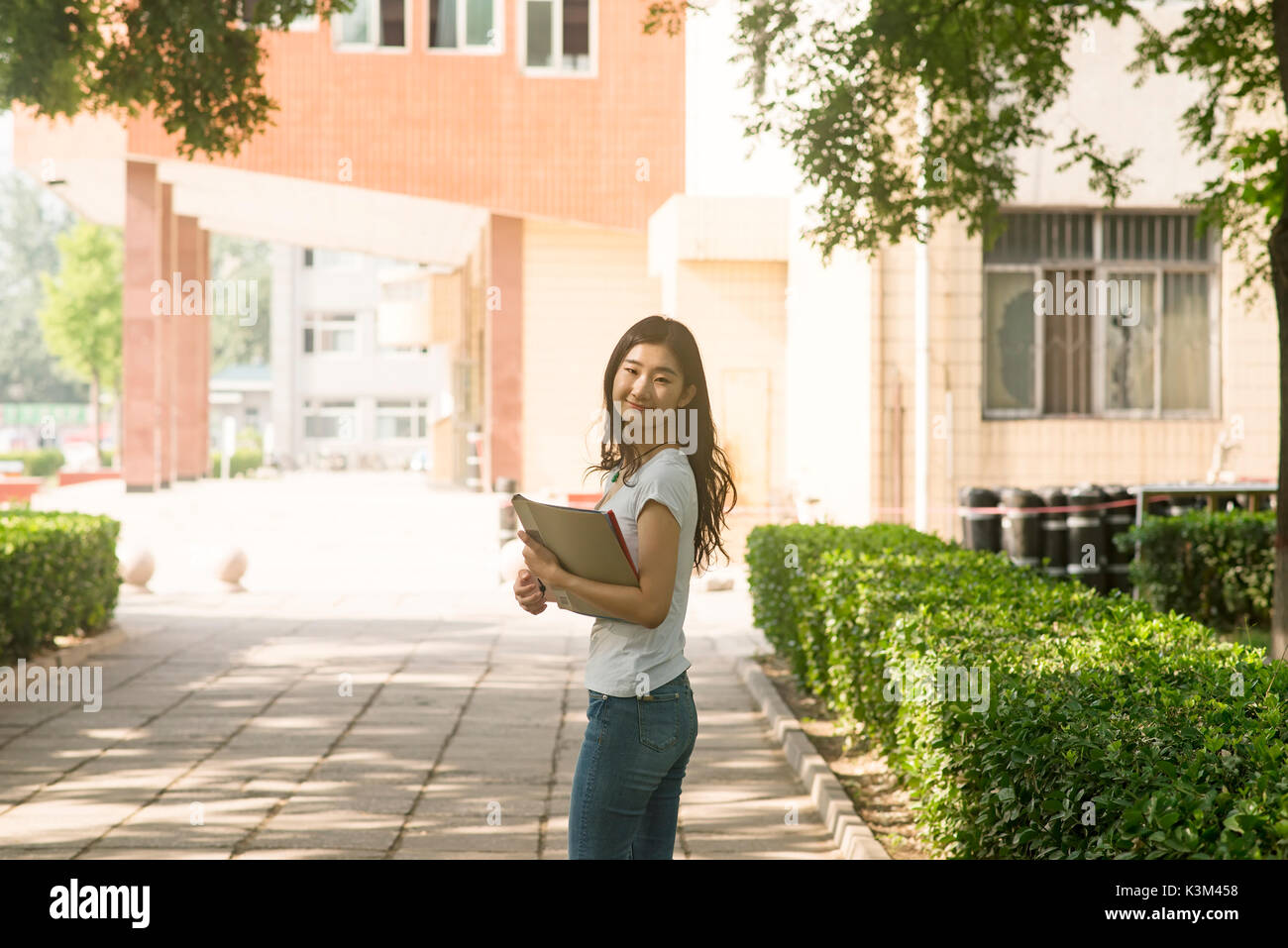 Happy of a Asian college student at Campus Stock Photo - Alamy