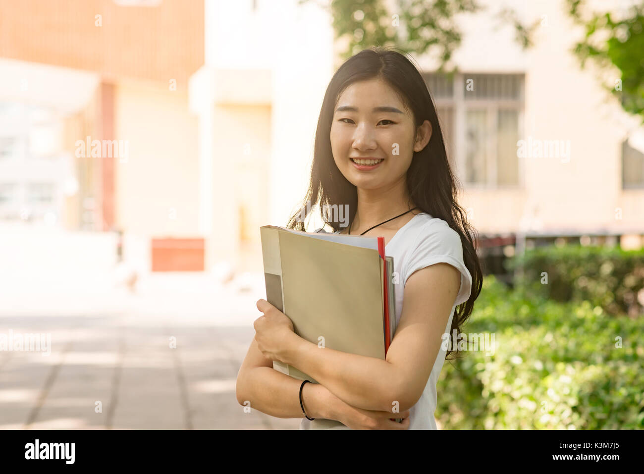 Happy of a Asian college student at Campus Stock Photo - Alamy