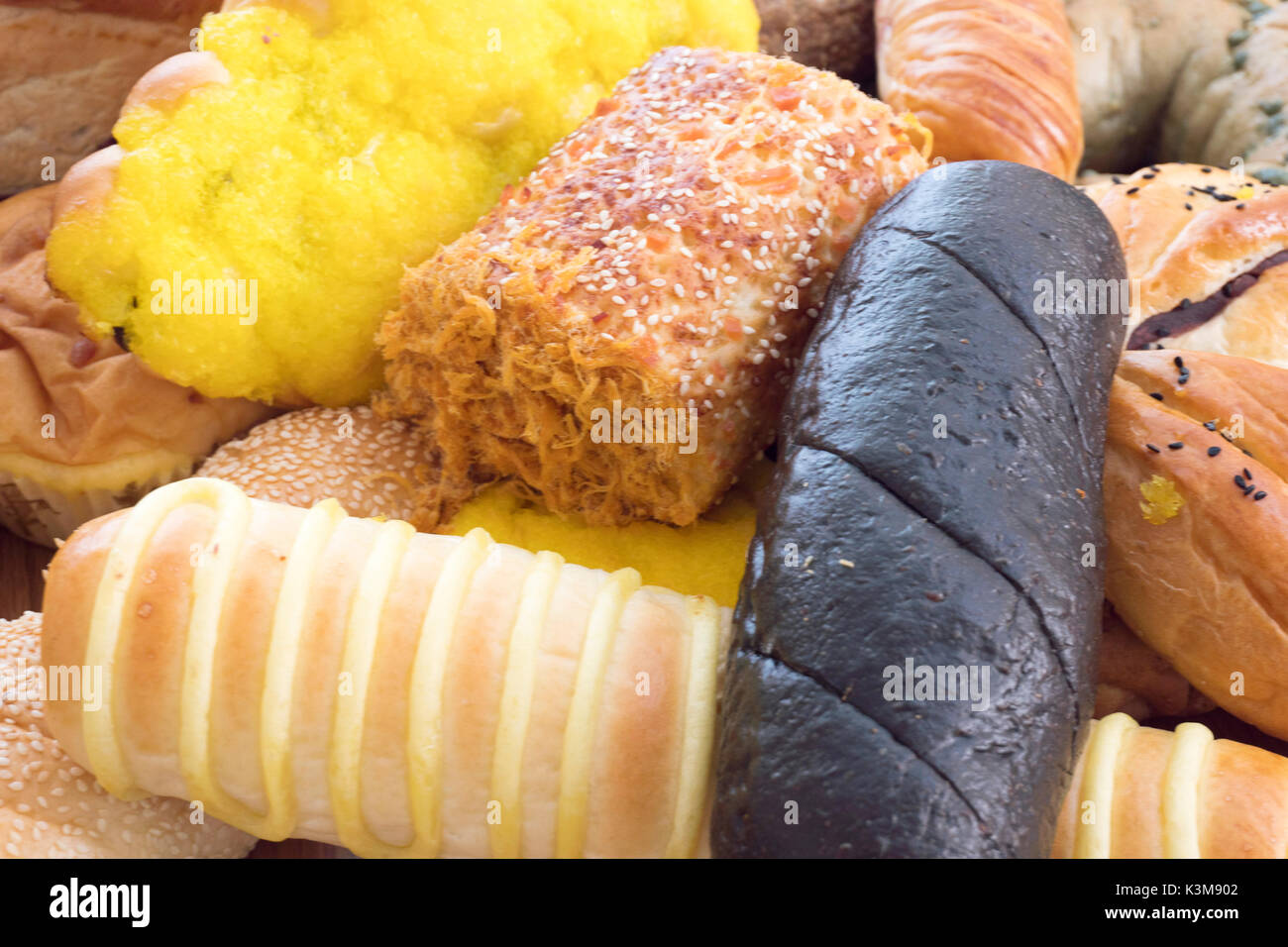 Features a variety of bread products on the table Stock Photo - Alamy